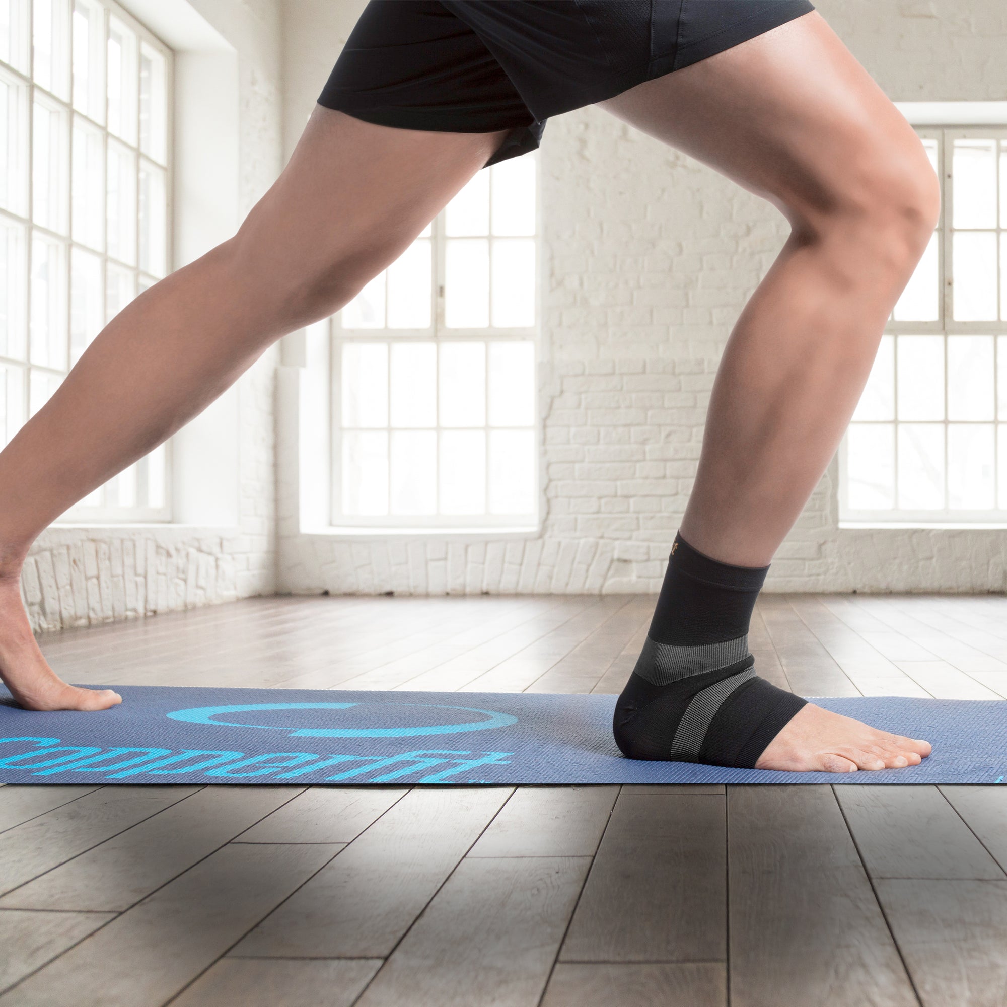 Ankle Compression Sleeve with Kinesiology Bands - Copper Fit